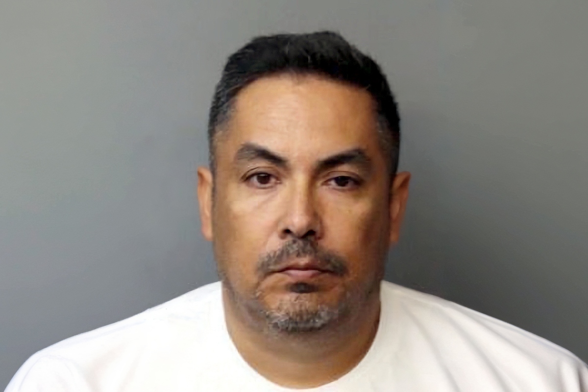 Gerardo Rodríguez caught pointing a gun at a minor